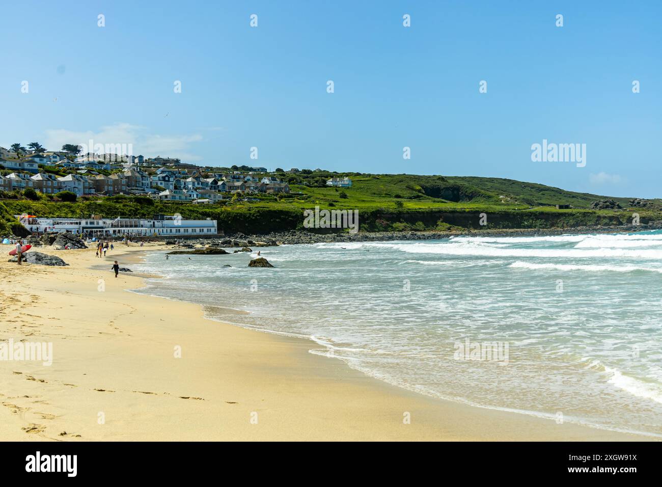 A relaxing day on the beach in front of St Ives Bay in beautiful ...