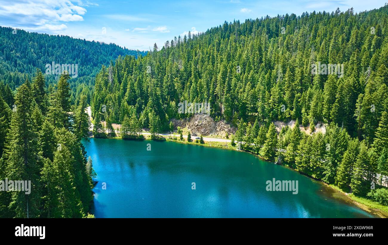 Aerial View of Pristine Blue Lake and Evergreen Forest Stock Photo - Alamy