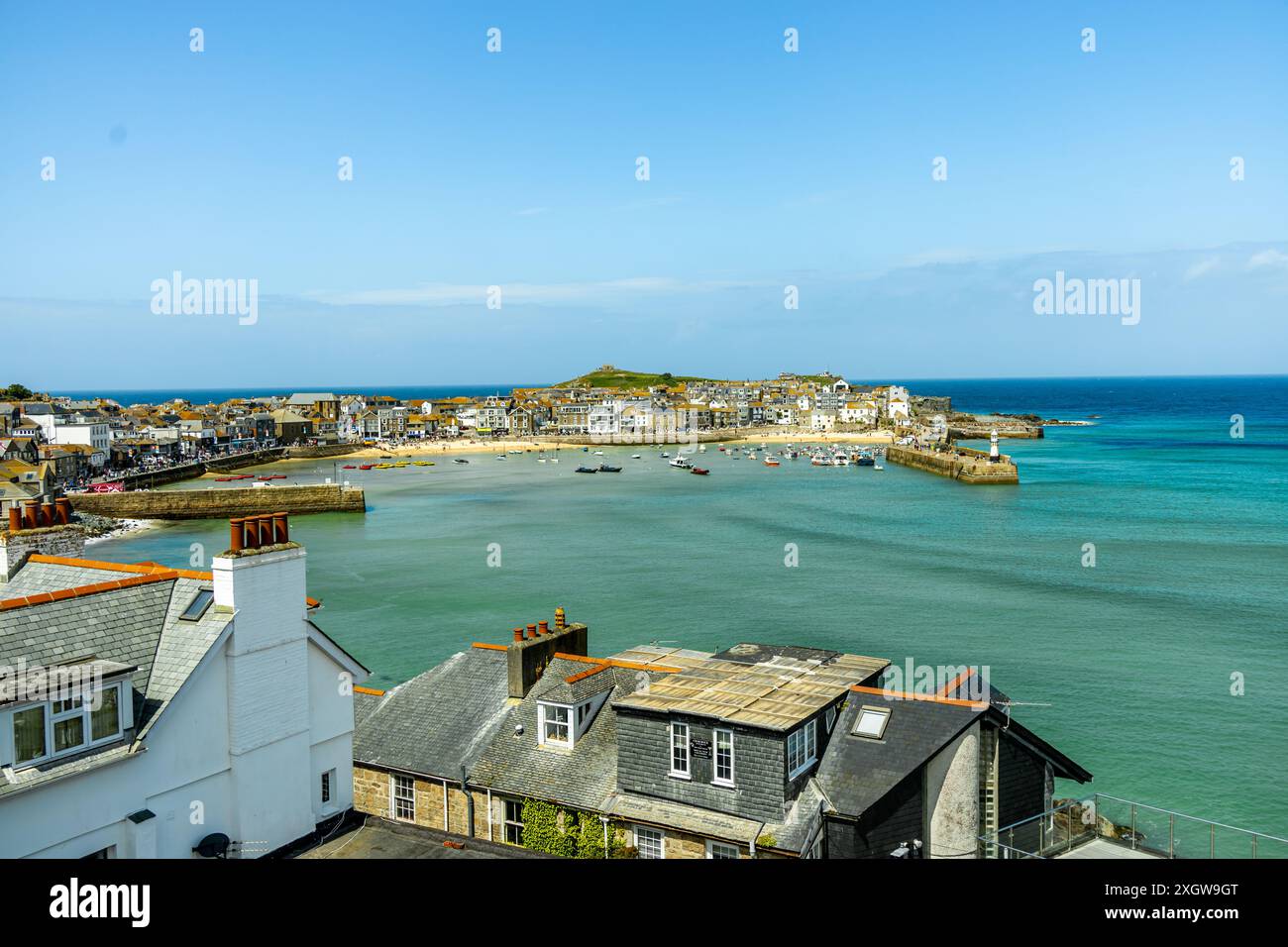 A relaxing day on the beach in front of St Ives Bay in beautiful ...