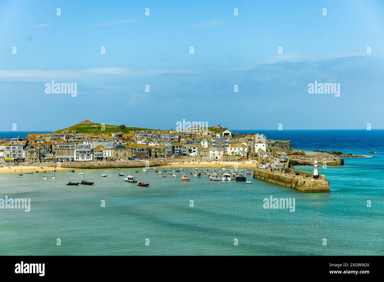 A relaxing day on the beach in front of St Ives Bay in beautiful ...