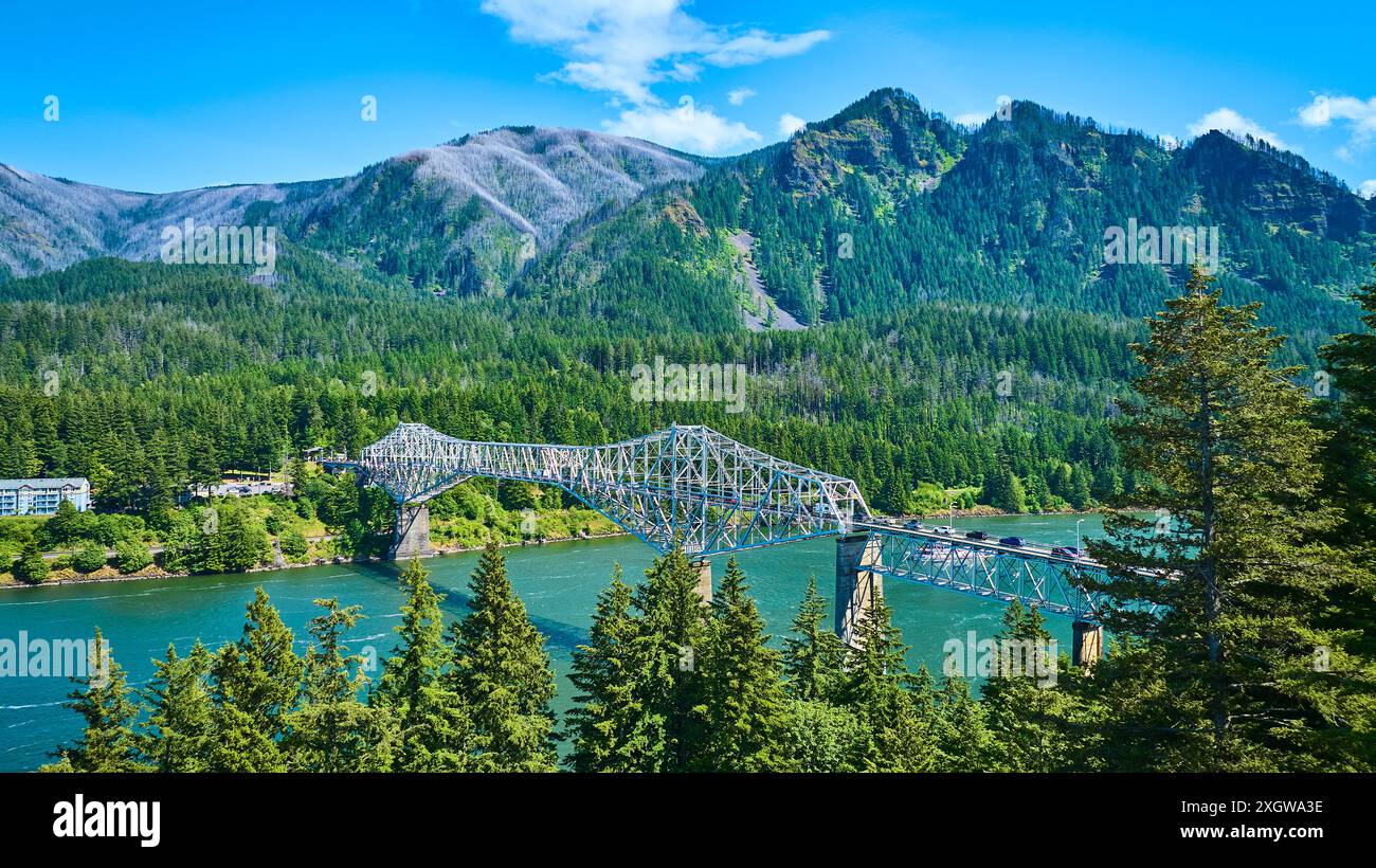 Aerial View of Bridge of the Gods Over Serene River and Lush Forest ...