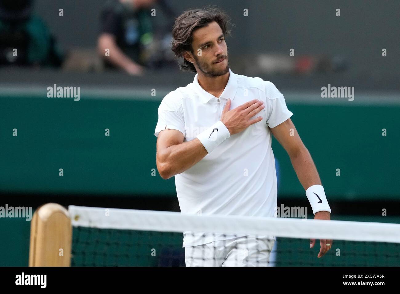 Lorenzo Musetti of Italy reacts after defeating Taylor Fritz of the ...