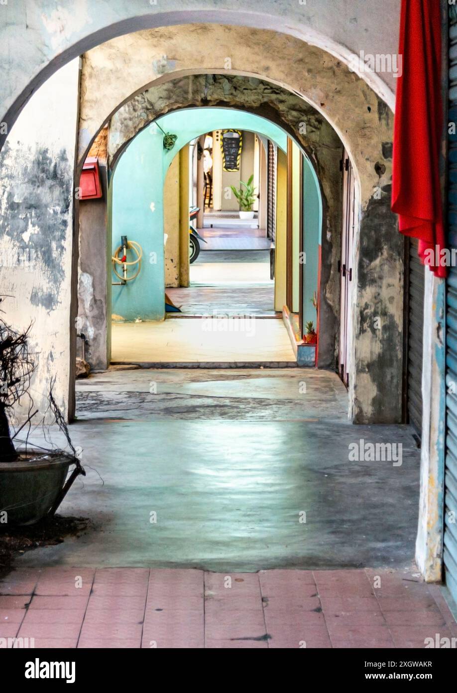 The covered colonial arches lining the buildings' exteriors,offering ...