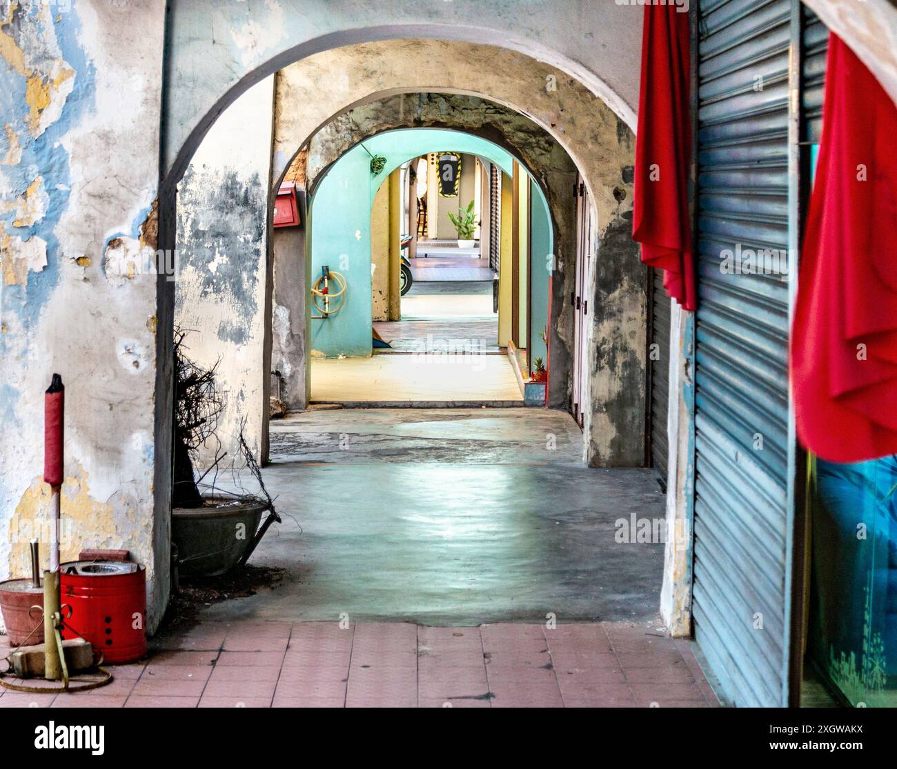 The covered colonial arches lining the buildings' exteriors,offering ...
