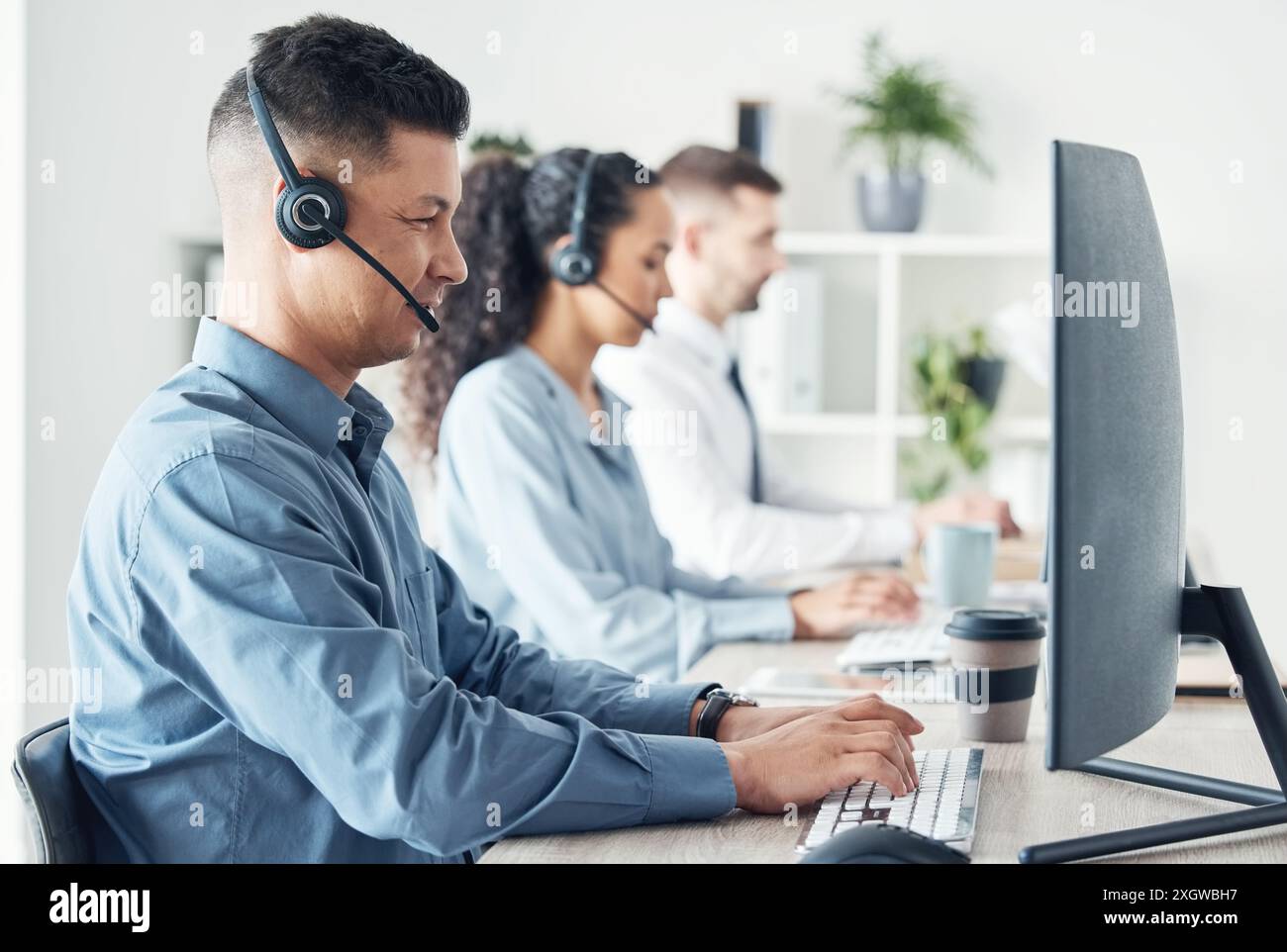 Typing, call center and people with headset, computer and man with ...