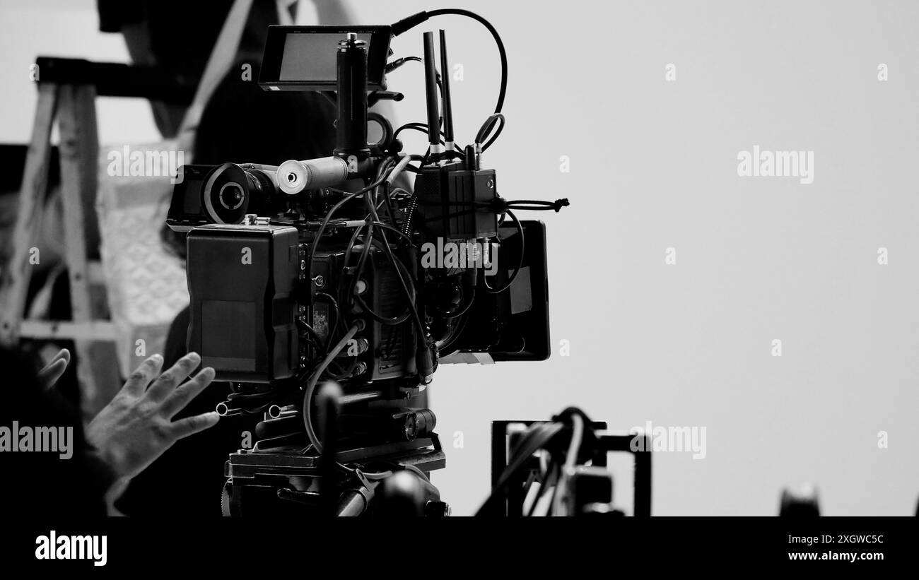 Film director and crew making commercial content advertising in studio ...