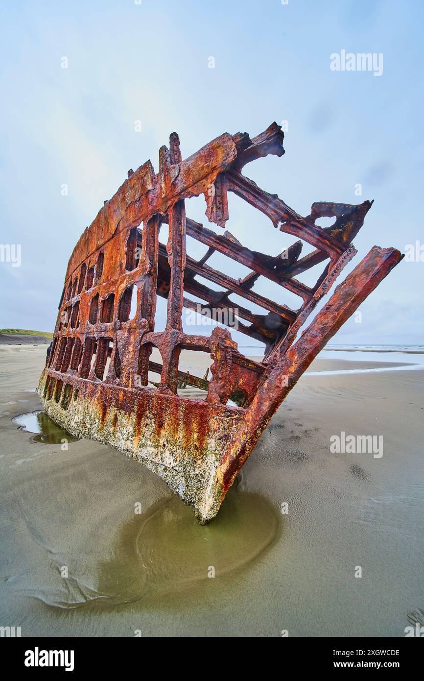 Rusted Shipwreck on Sandy Beach with Low Angle Perspective Stock Photo ...