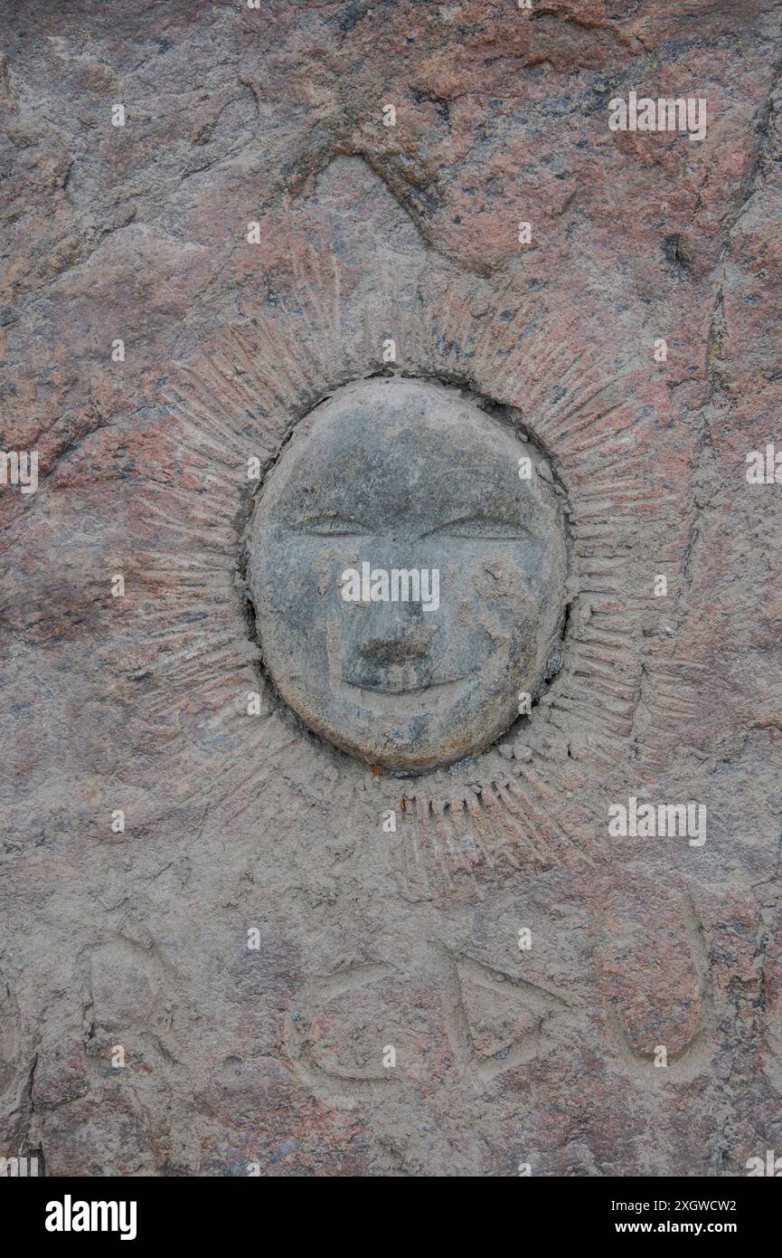 Sculpture stone carving of face portrait on Queen Elizabeth Way in ...