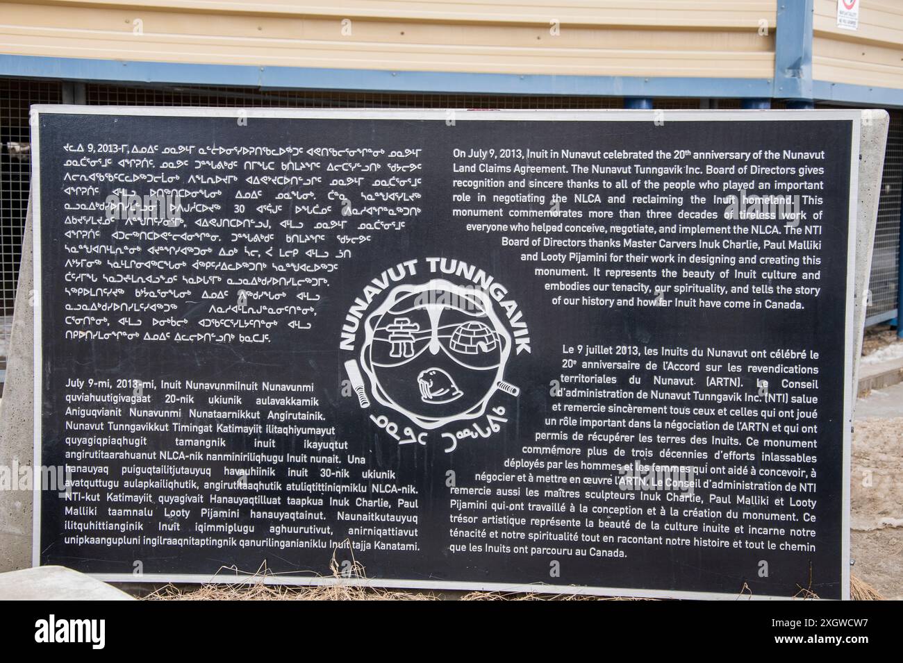 Sign providing information on the Inuit sculpture monument at the Four ...