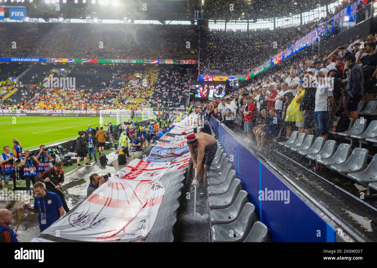 Dortmund, Germany. 10th Jul 2024. England fans have fun under a ...