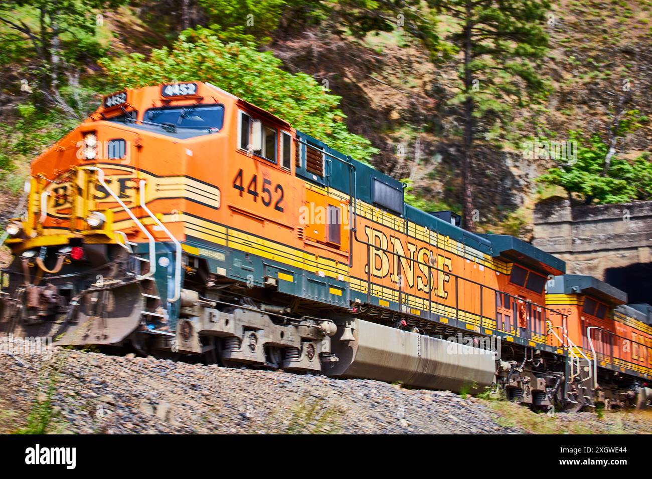 BNSF Freight Train in Motion Through Columbia Gorge Lush Landscape ...
