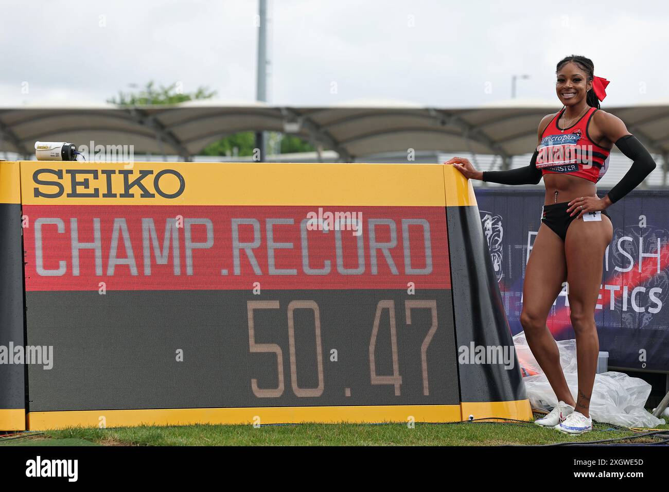 Amber ANNING of Brighton & Hove AC by the timing clock after winning ...