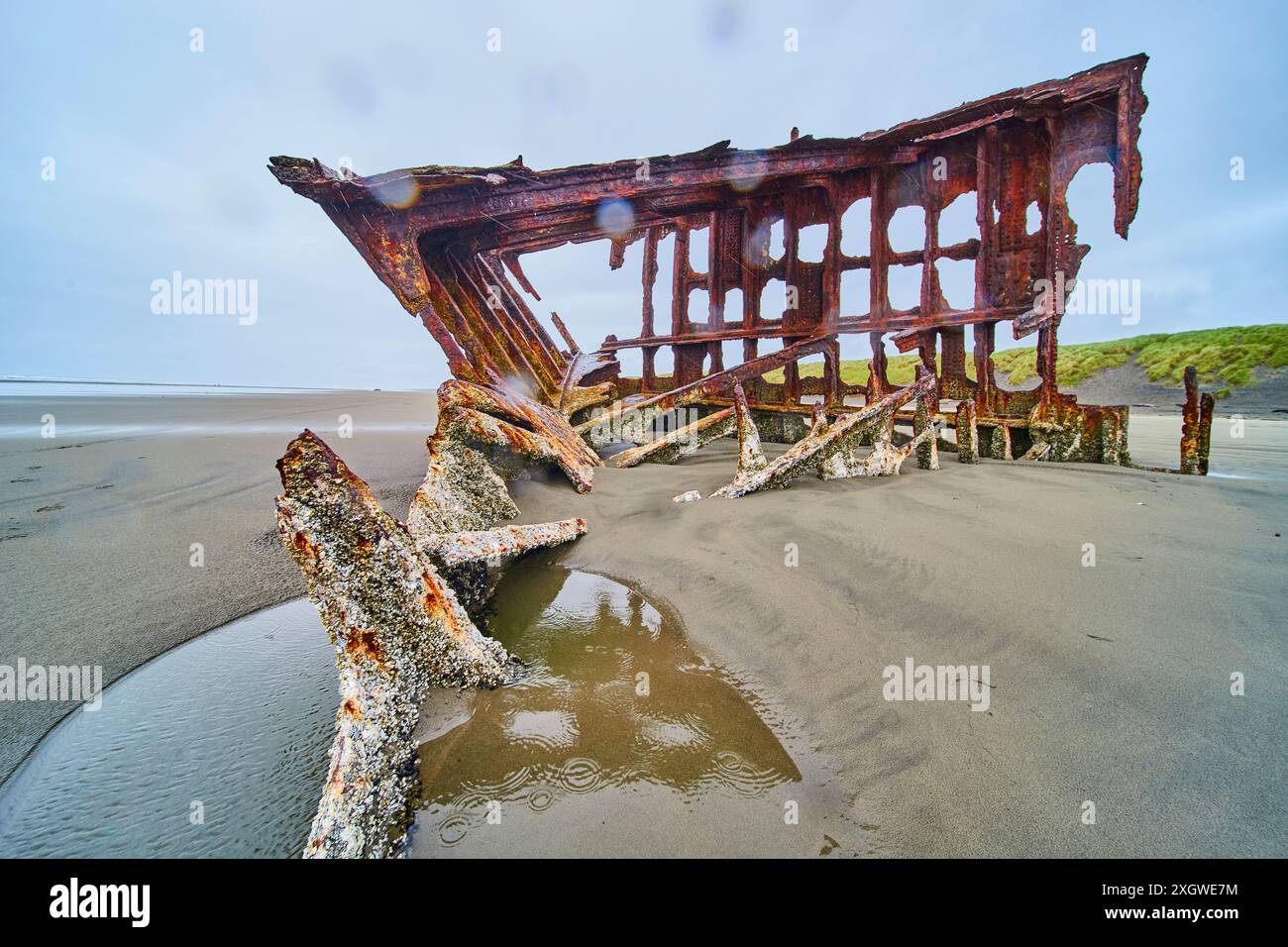Rusted Shipwreck on Desolate Beach Low Angle Perspective Stock Photo ...