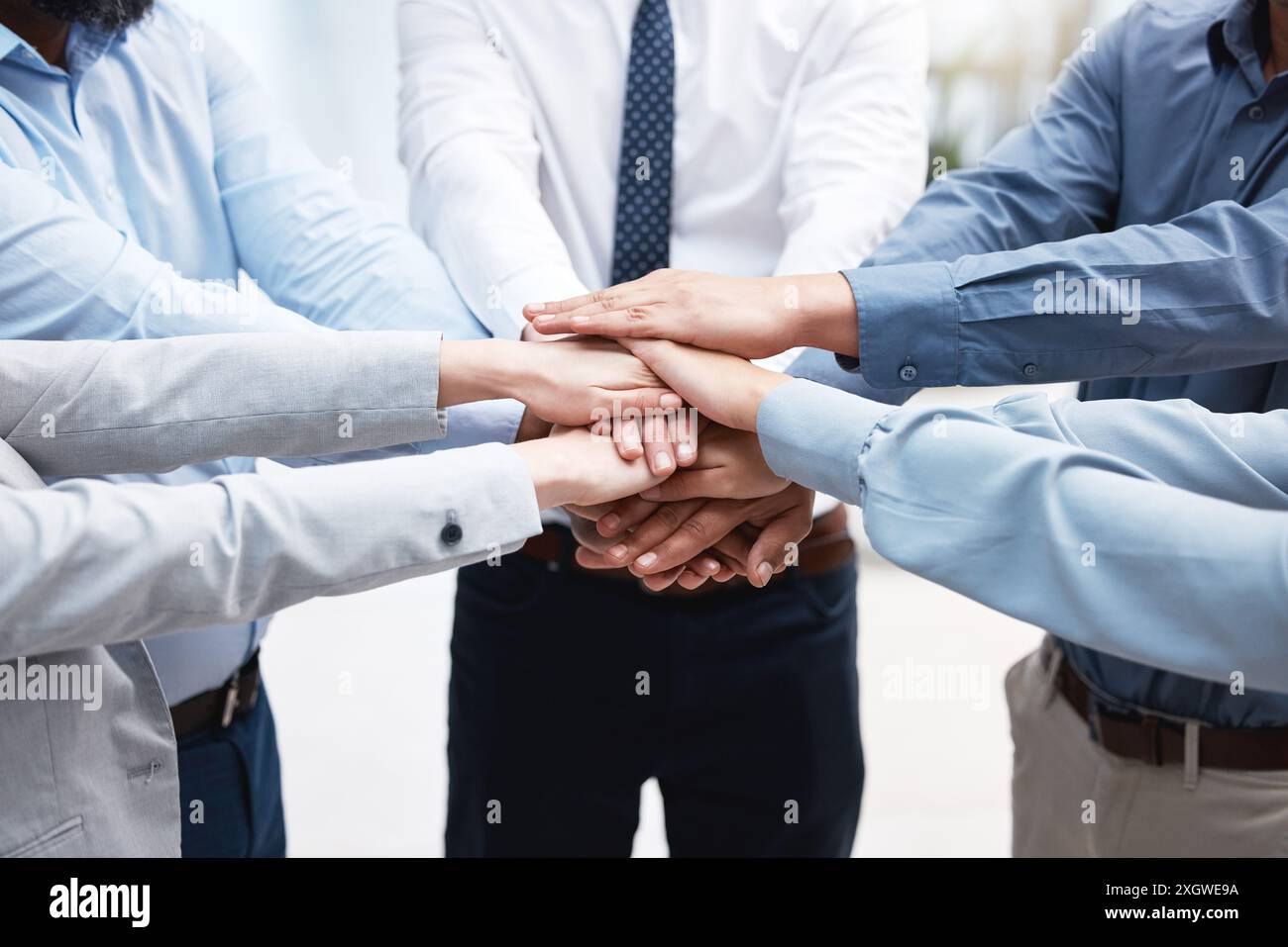 Employees, hands and company team building in stack, support and partnership for agreement ...