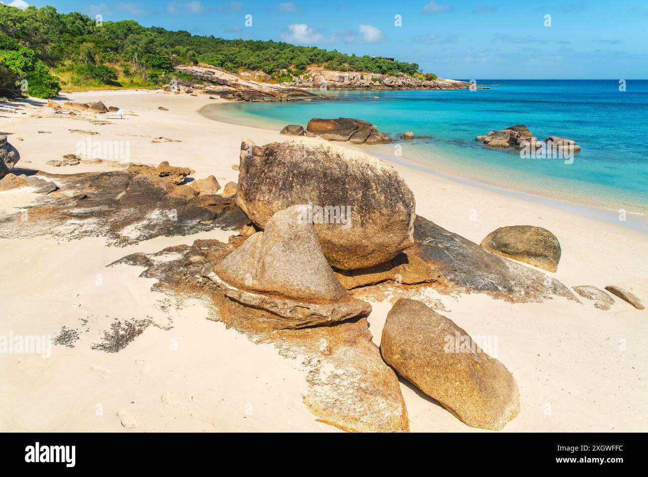 Picturesque tropical golden sandy Sunset Beach with turquoise water on ...