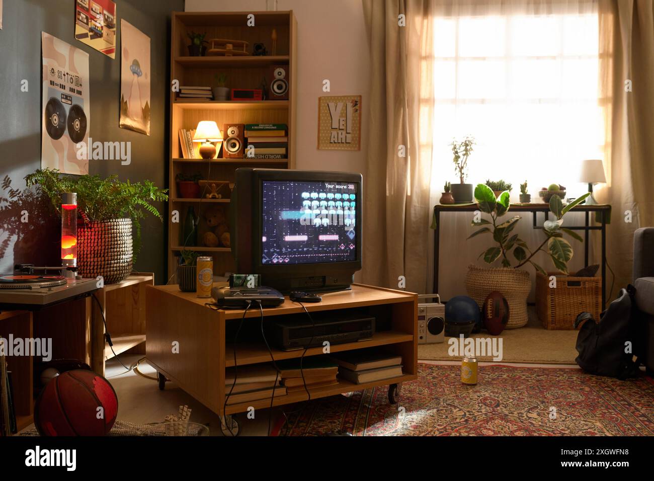 Retro gaming setup with old-fashioned TV, gaming console, and nostalgic ...