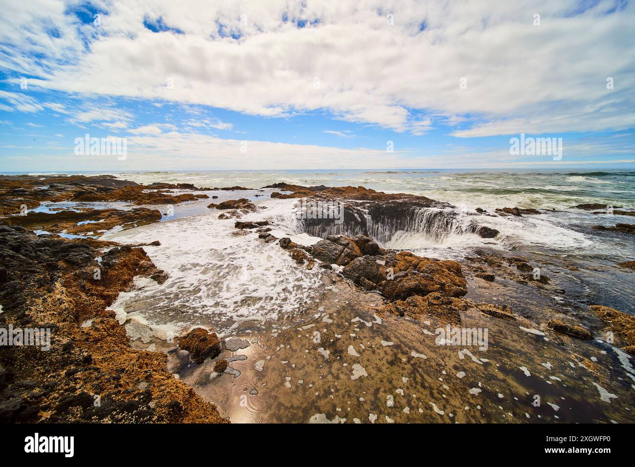 Thor's Well Waterfall Effect Over Rugged Rocks Low Perspective Stock ...
