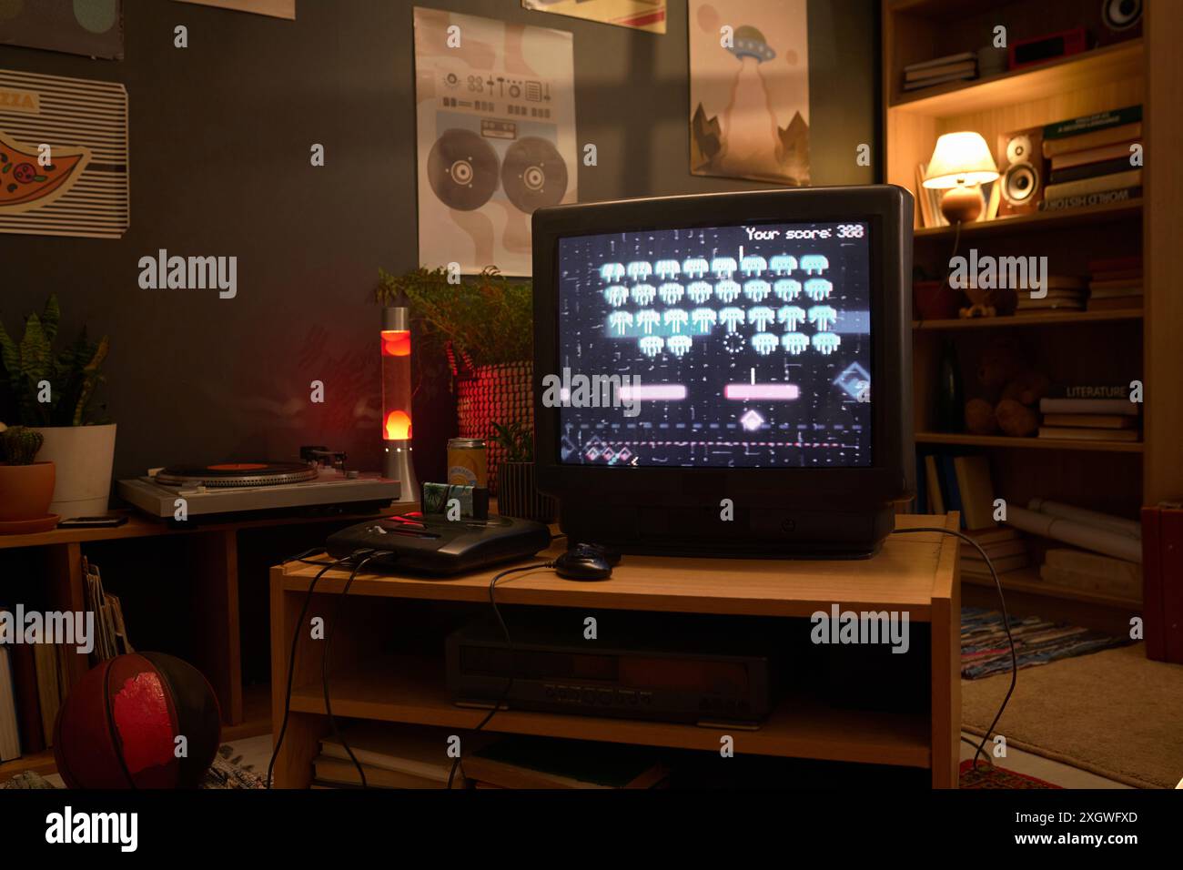 Close-up shot focusing on retro TV gaming setup with eighties eight bit ...