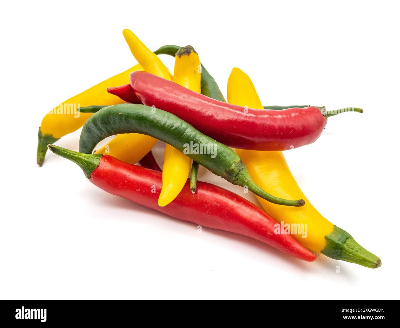 assorted fresh chili peppers on white background Stock Photo - Alamy