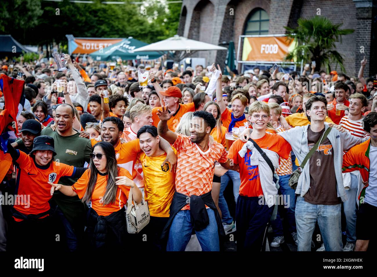 AMSTERDAM - 10/07/2024, Dutch fans in the run-up to the semi-final in ...