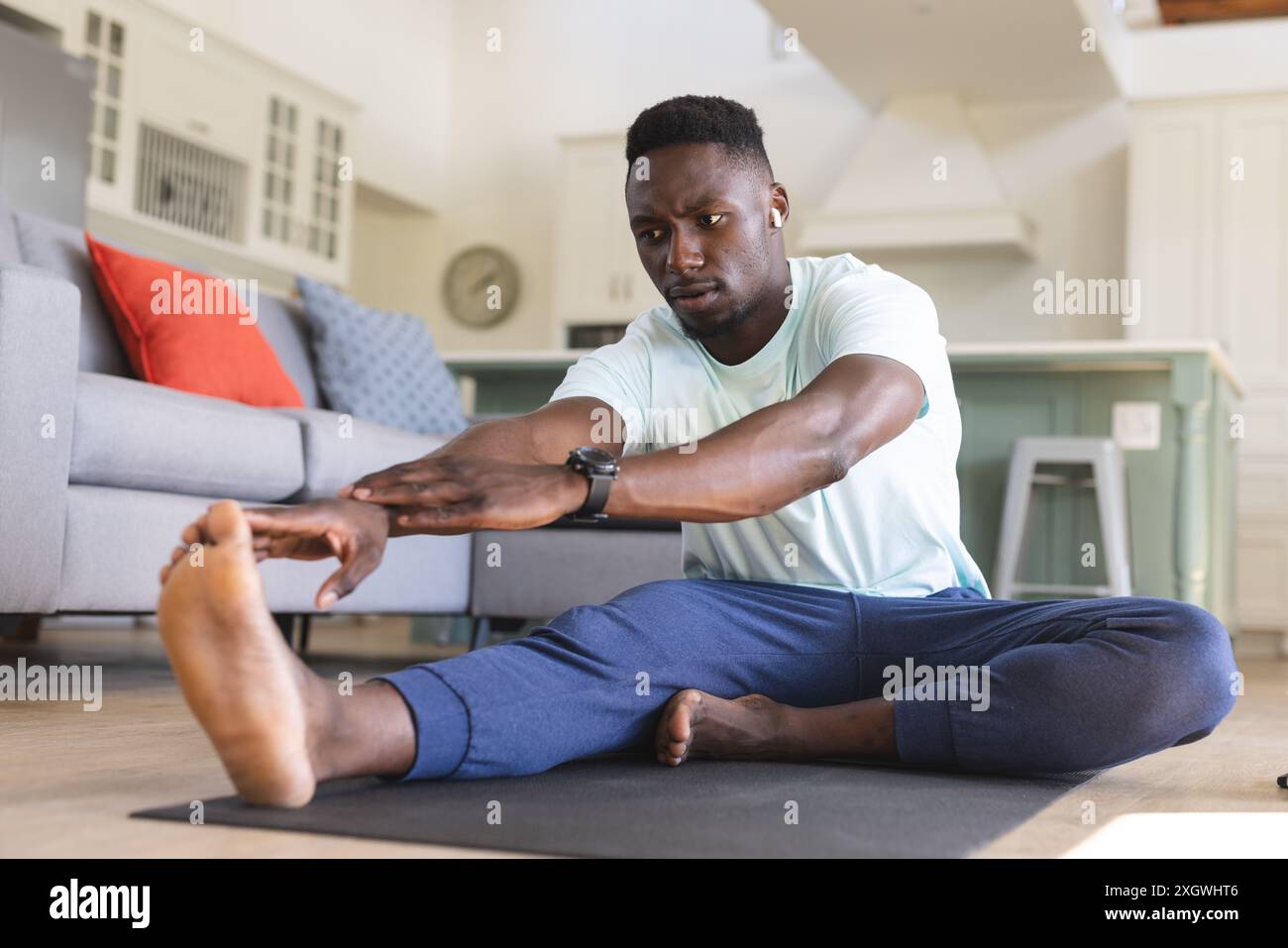 Man stretching toes gym hi-res stock photography and images - Alamy