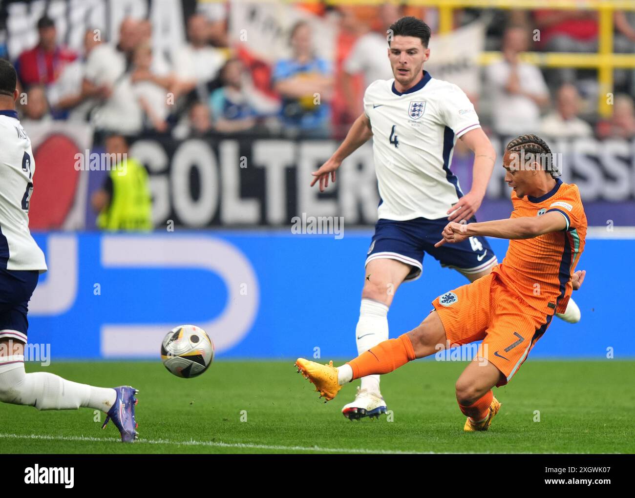 Netherlands' Xavi Simons scores their side's first goal of the game ...