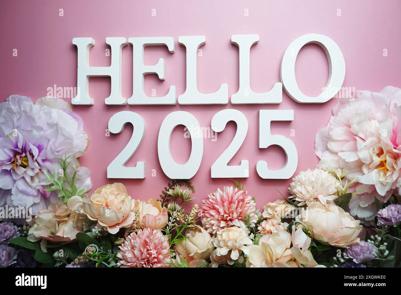 Hello 2025 alphabet letter with flower decoration on pink background ...