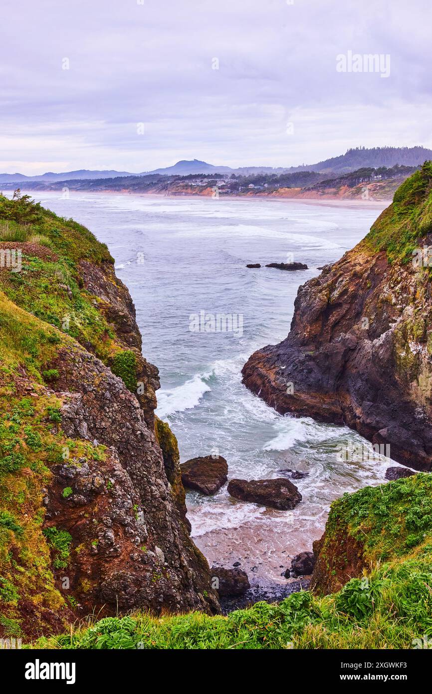 Rugged Cliffside and Turbulent Sea with Lush Foreground Aerial View ...