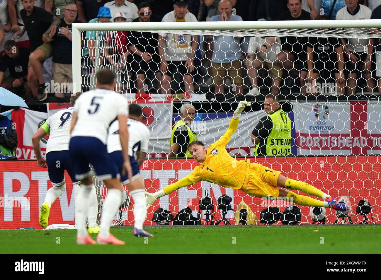 England's Harry Kane scores their side's first goal of the game during ...
