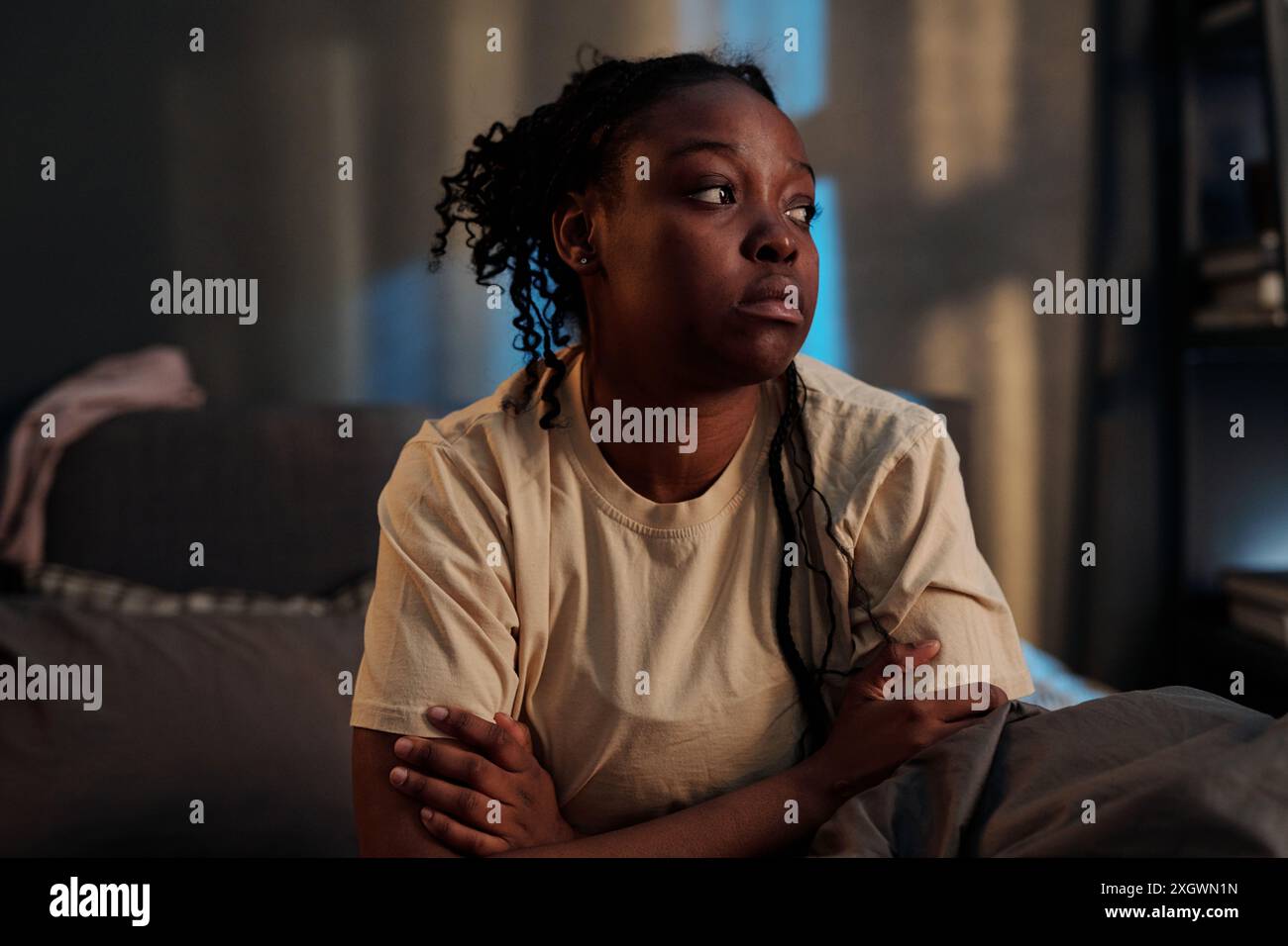 Young depressed woman with post traumatic syndrome unable to sleep ...