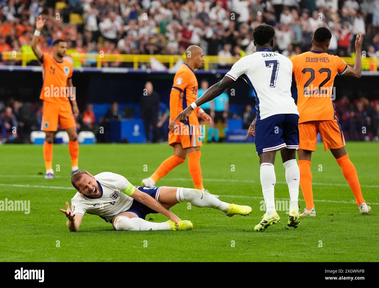 England's Harry Kane reacts after being fouled by Netherlands's Denzel ...