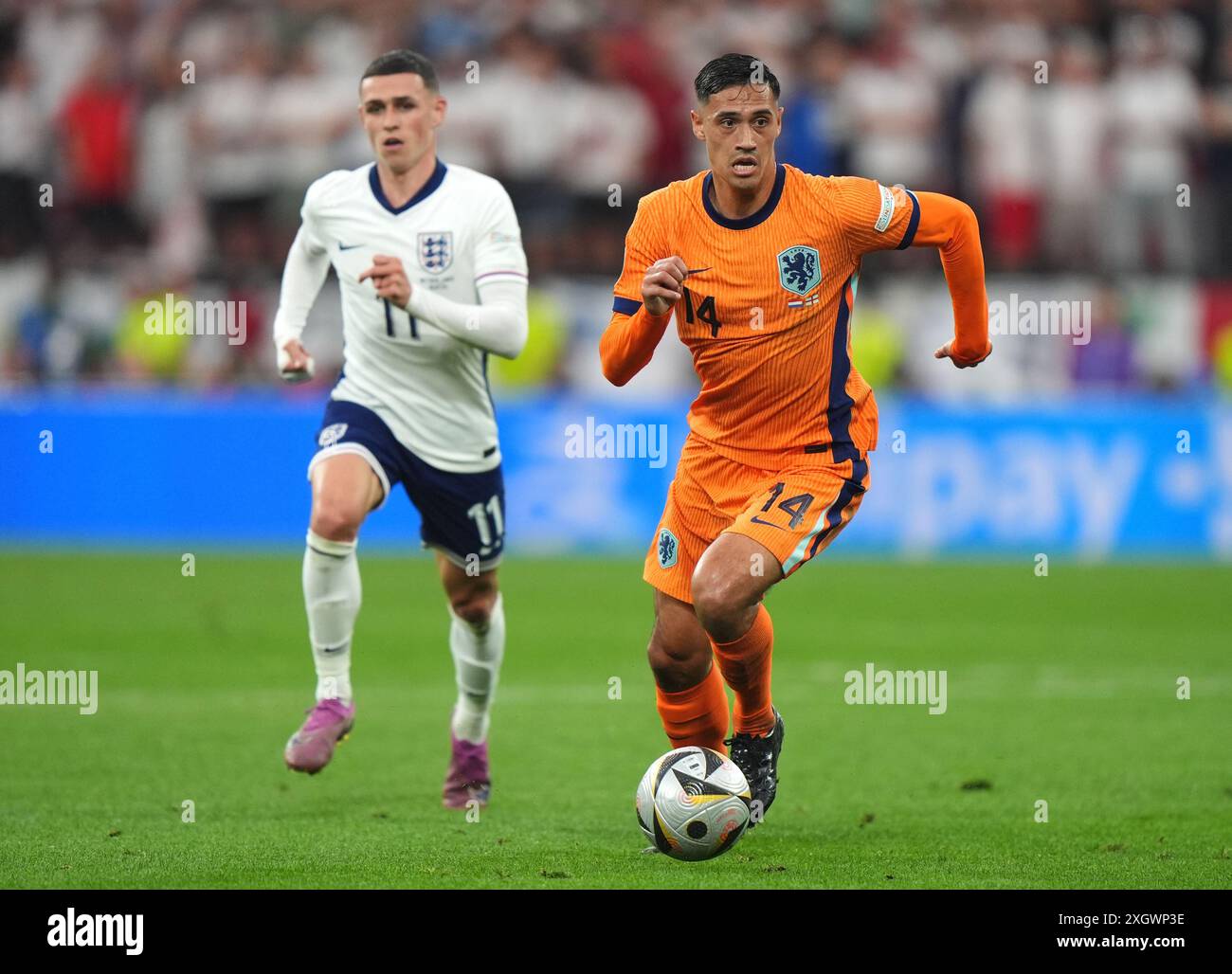 England's Phil Foden (left) and Netherlands' Tijjani Reijnders in ...