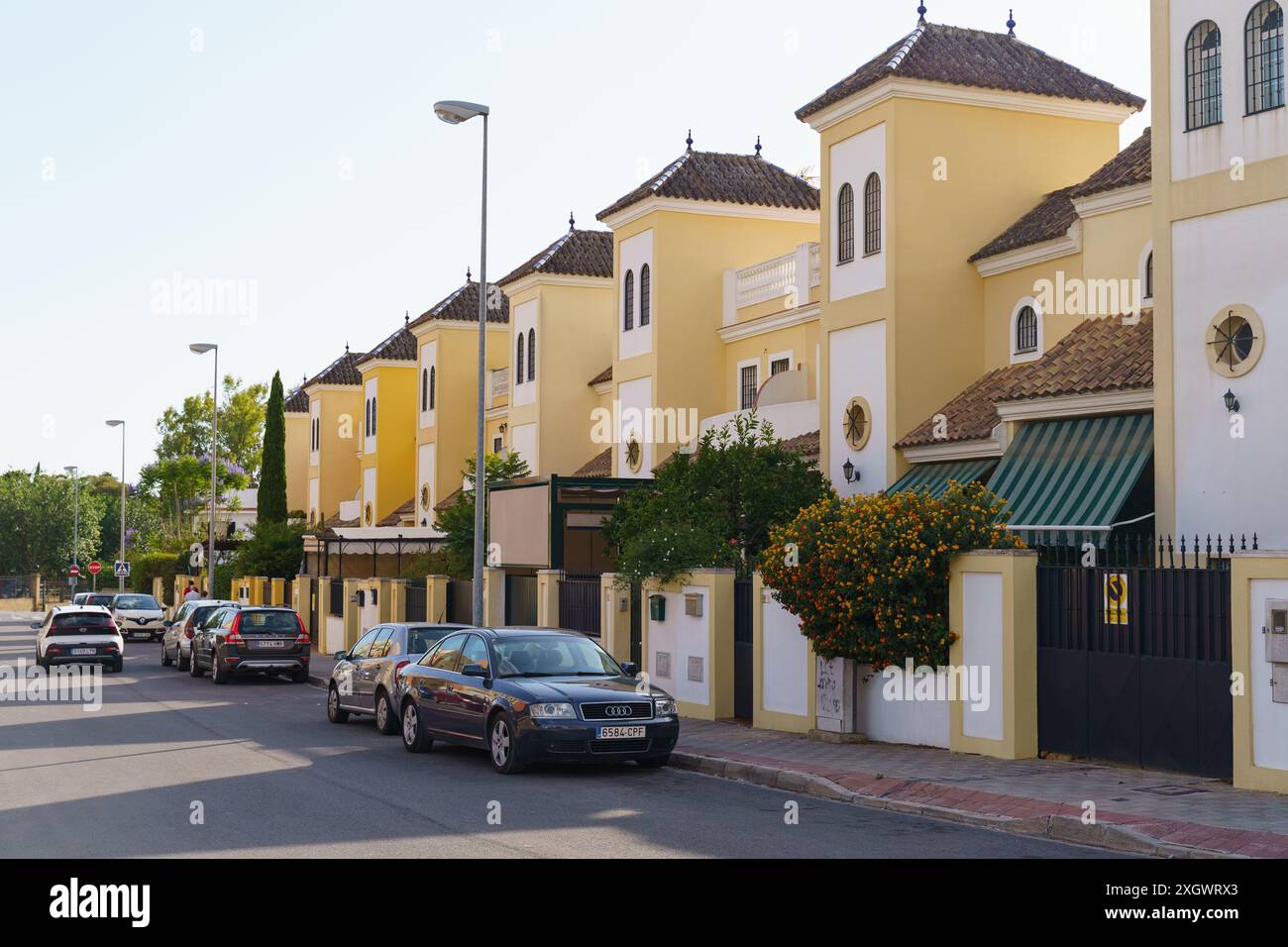 Dos Hermanas, Spain - June 1, 2023: A row of pastel yellow ...