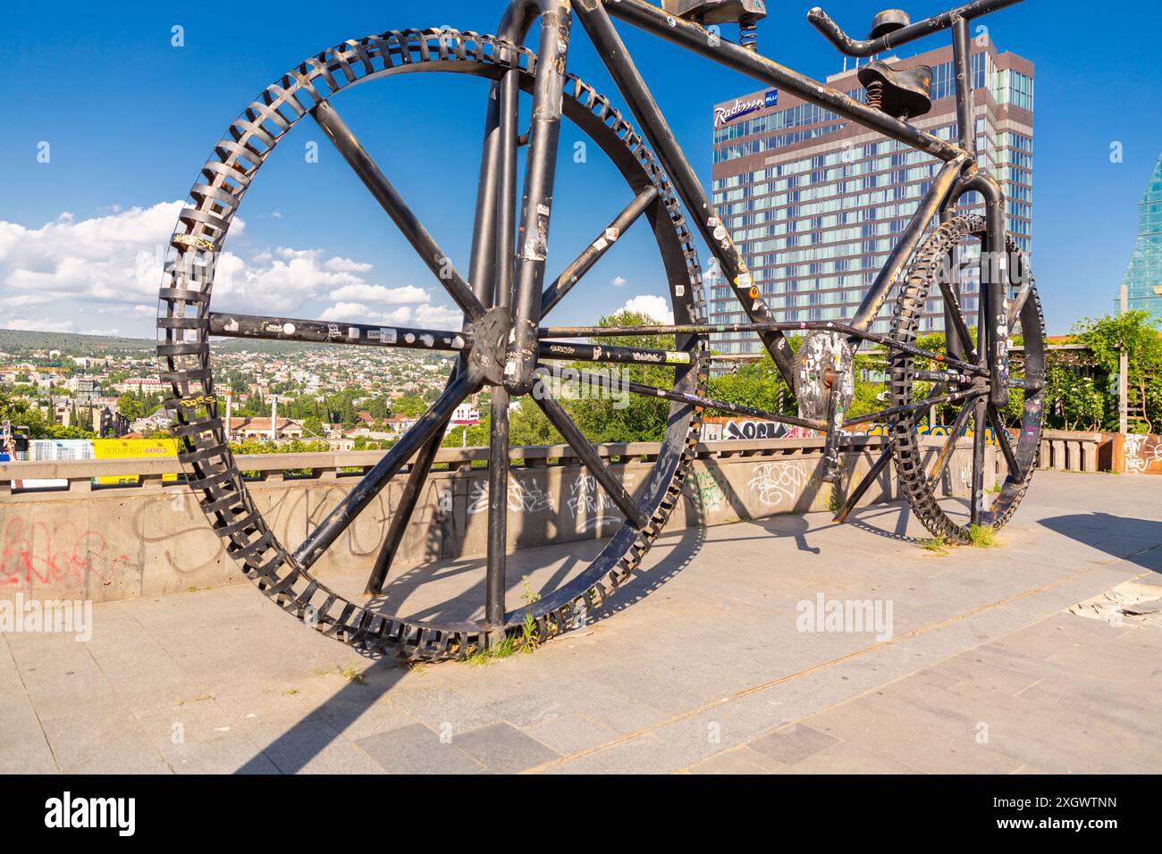 Tbilisi, Georgia - 23 JUNE, 2024: Gigantic bicycle statue with two ...