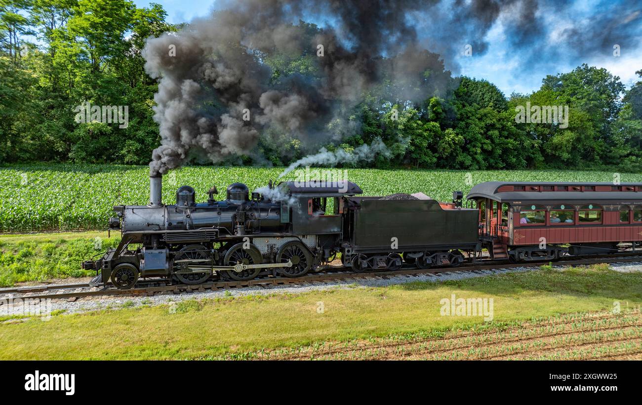 The Black Steam Locomotive Number 89, Emitting Thick Black Smoke ...