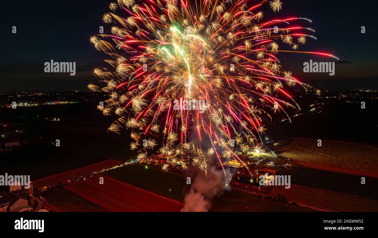 Spectacular Red And Gold Fireworks Burst Brilliantly In The Night Sky ...