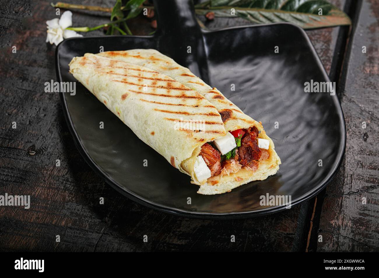 Shawarma roll with chicken and vegetables Stock Photo - Alamy