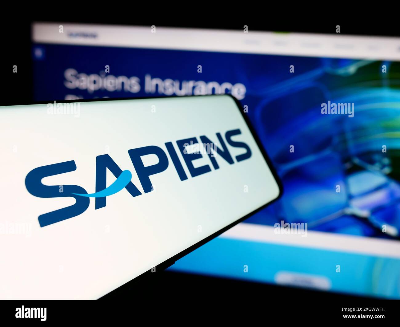 Mobile phone with logo of Israeli company Sapiens International ...