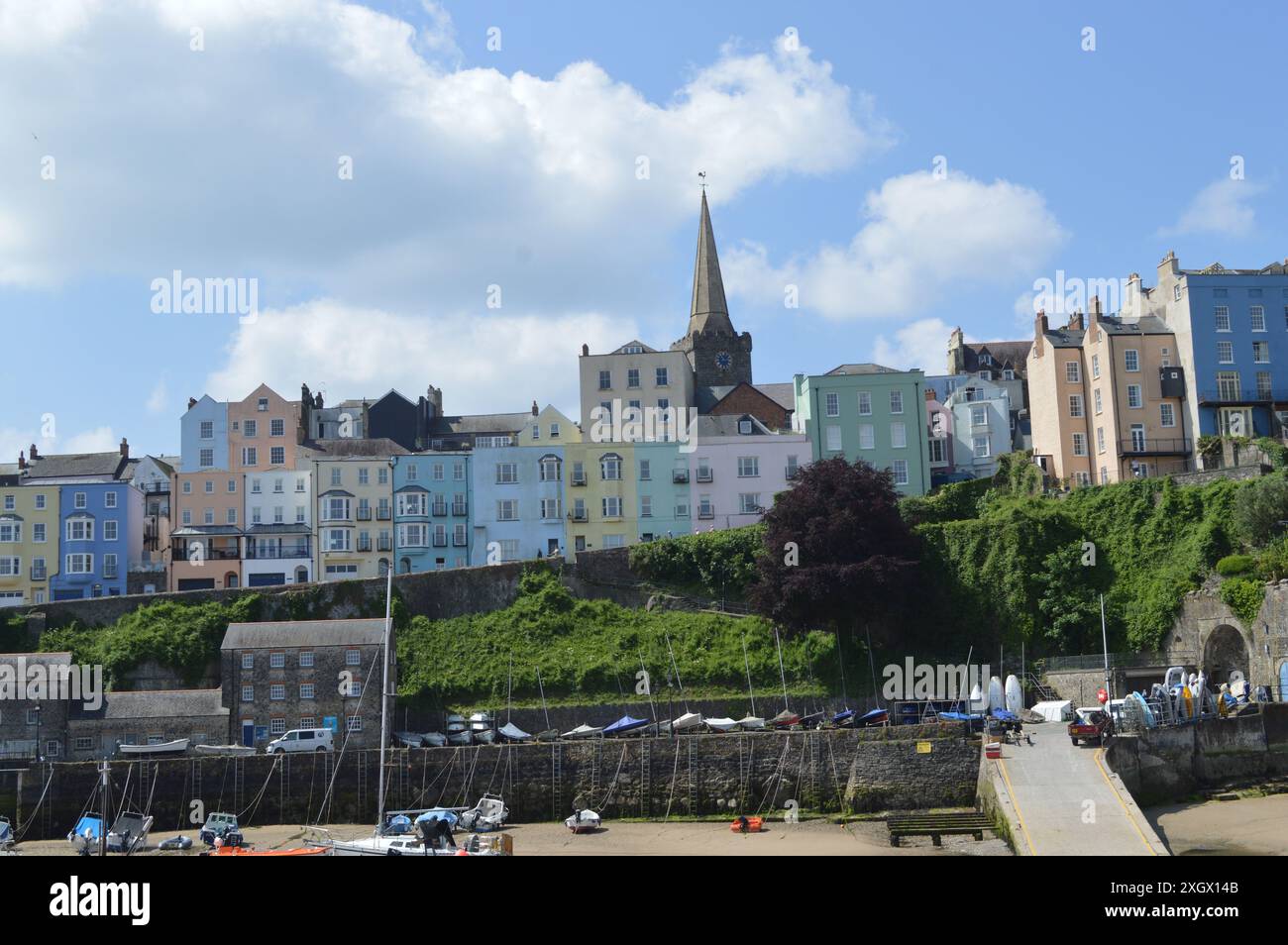 Colourful houses of Tenby seen from the harbour and Pier Hill. Tenby ...