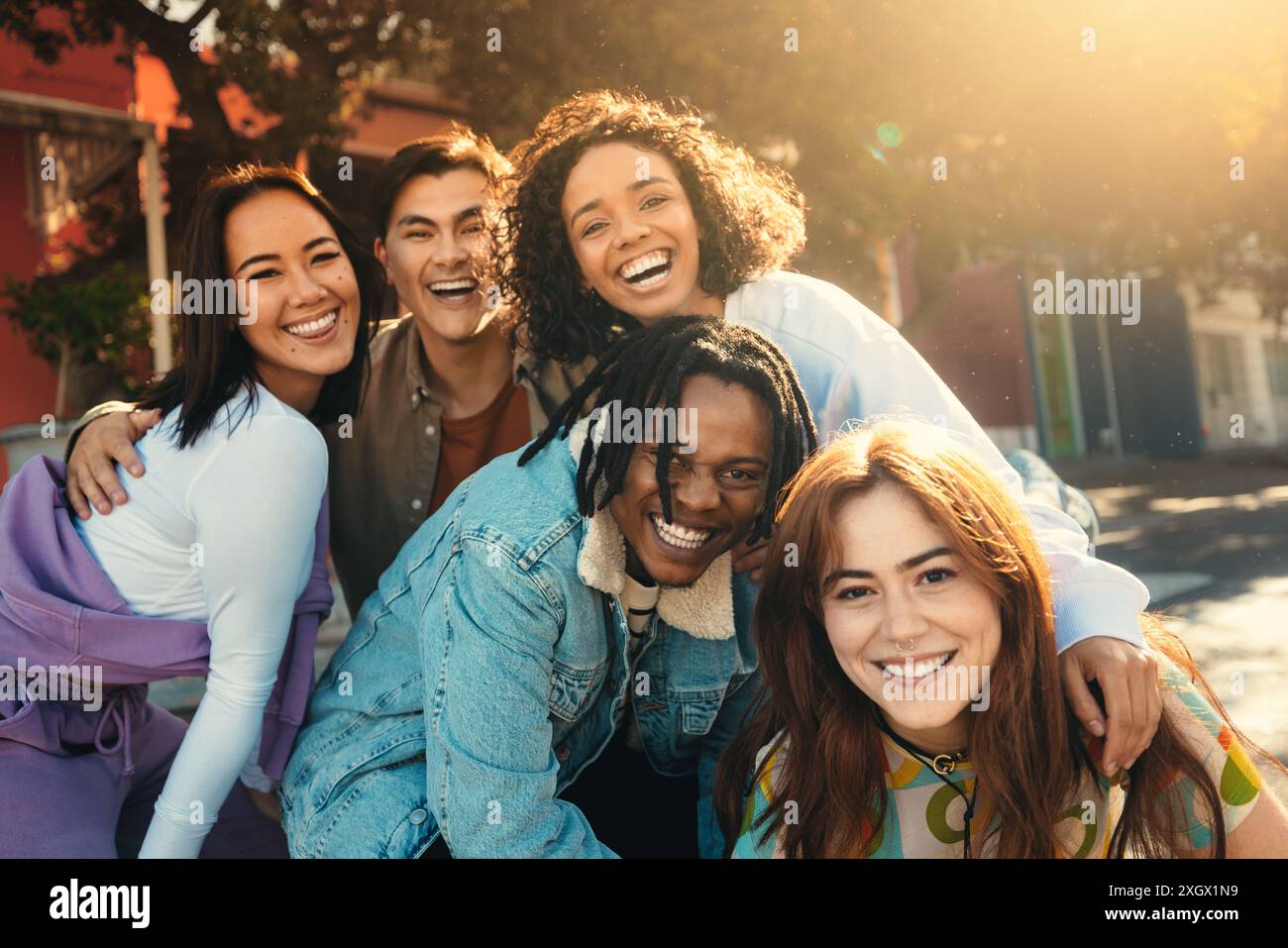 Diverse group friends capturing joyful hi-res stock photography and ...