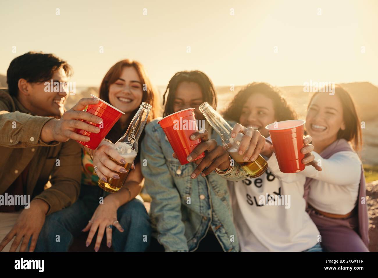 Group cheerful friends enjoying others hi-res stock photography and ...