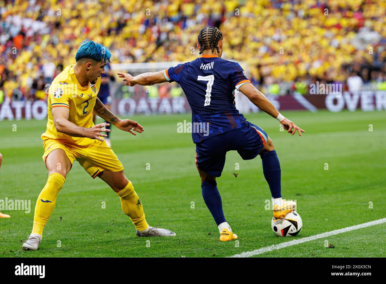 Xavi Simons, Andrei Ratiu seen during UEFA Euro 2024 Round of 16 game ...