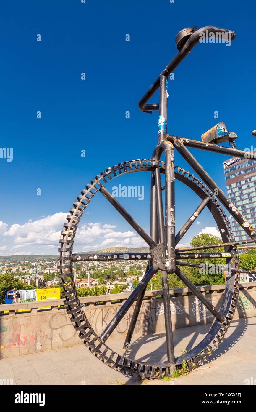 Tbilisi, Georgia - 23 JUNE, 2024: Gigantic bicycle statue with two ...