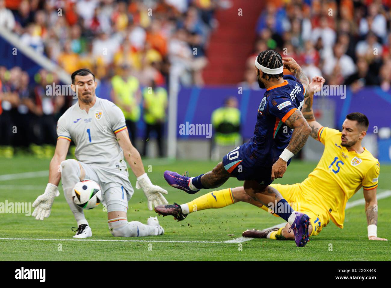 Florin Nita and Andrei Burca seen defending shot from Memphis Depay ...