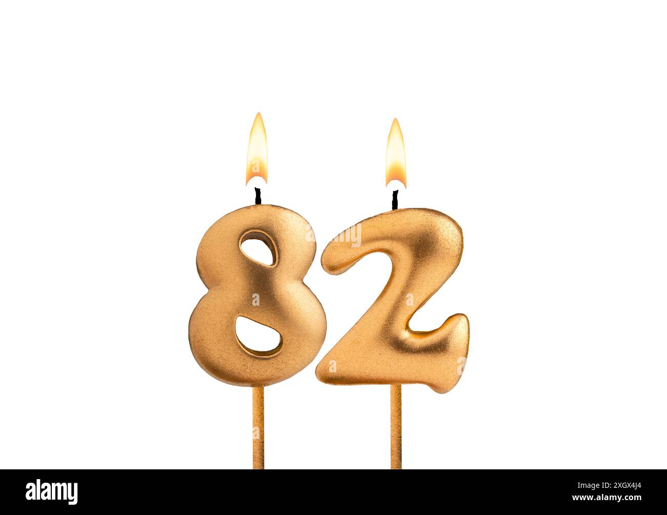 Birthday number 82 - Golden candle on white background Stock Photo - Alamy