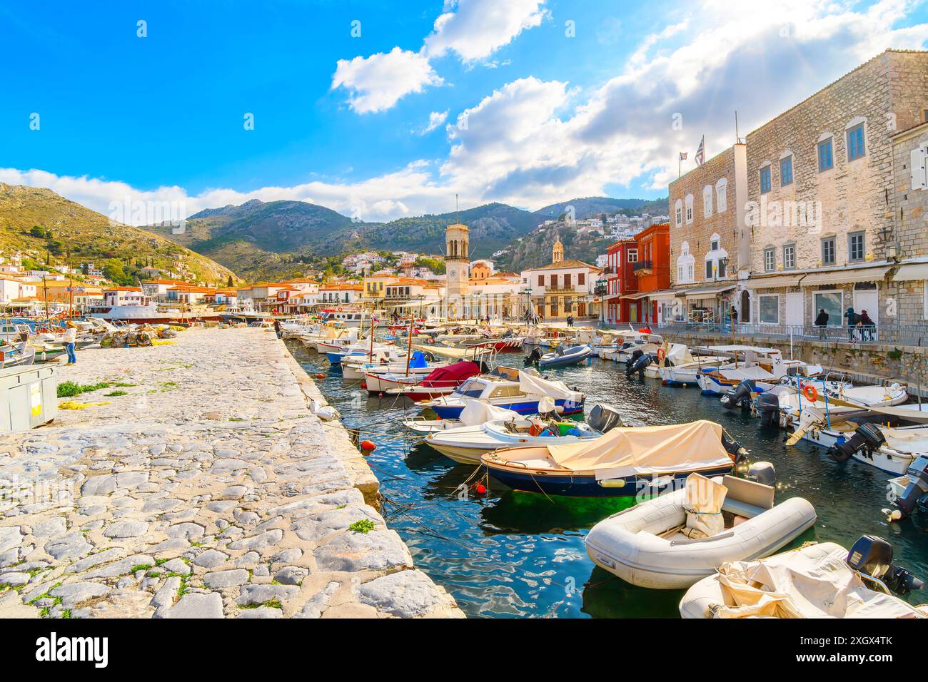 The harbor and port at the Greek island waterfront village of Hydra ...