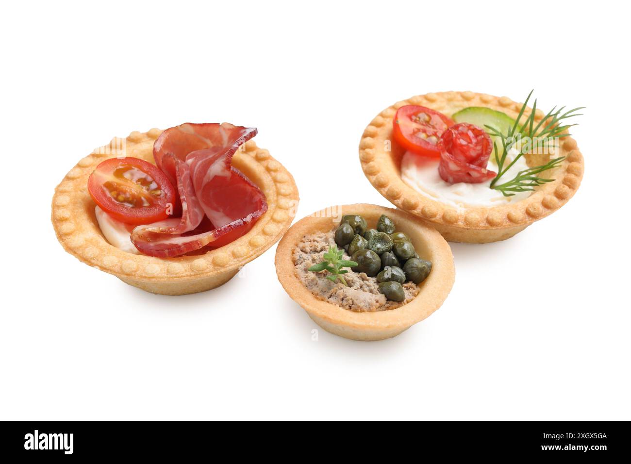 Delicious canapes with dry smoked sausage, jamon and pate isolated on ...