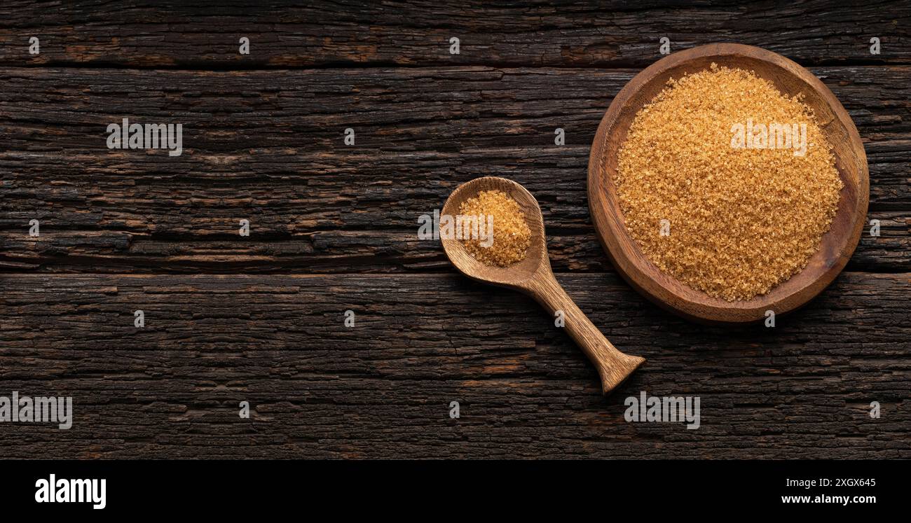 Organic cane panela powder in bowl and spoon - Saccharum officinarum ...