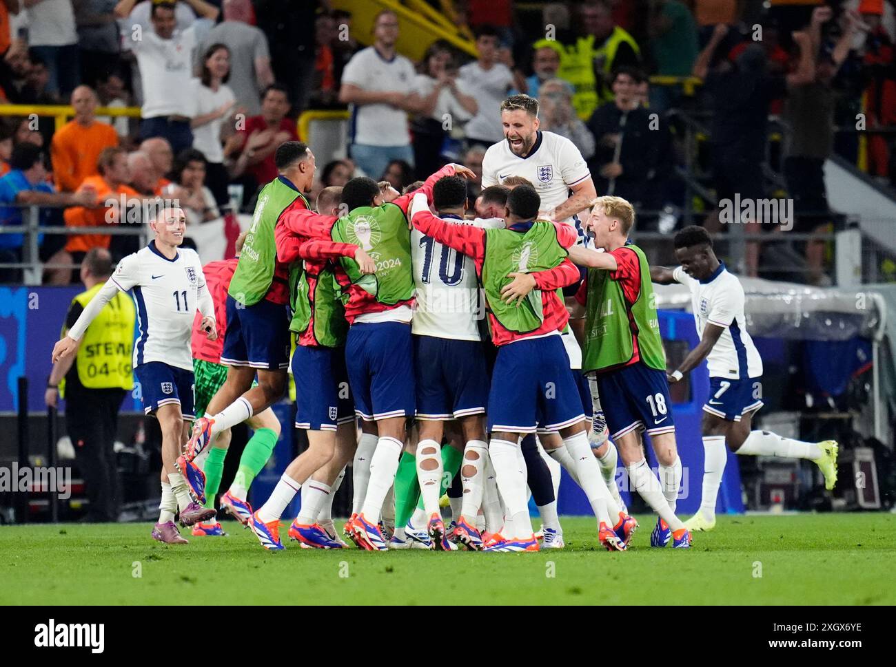 England players celebrate after Ollie Watkins (hidden) scores their ...