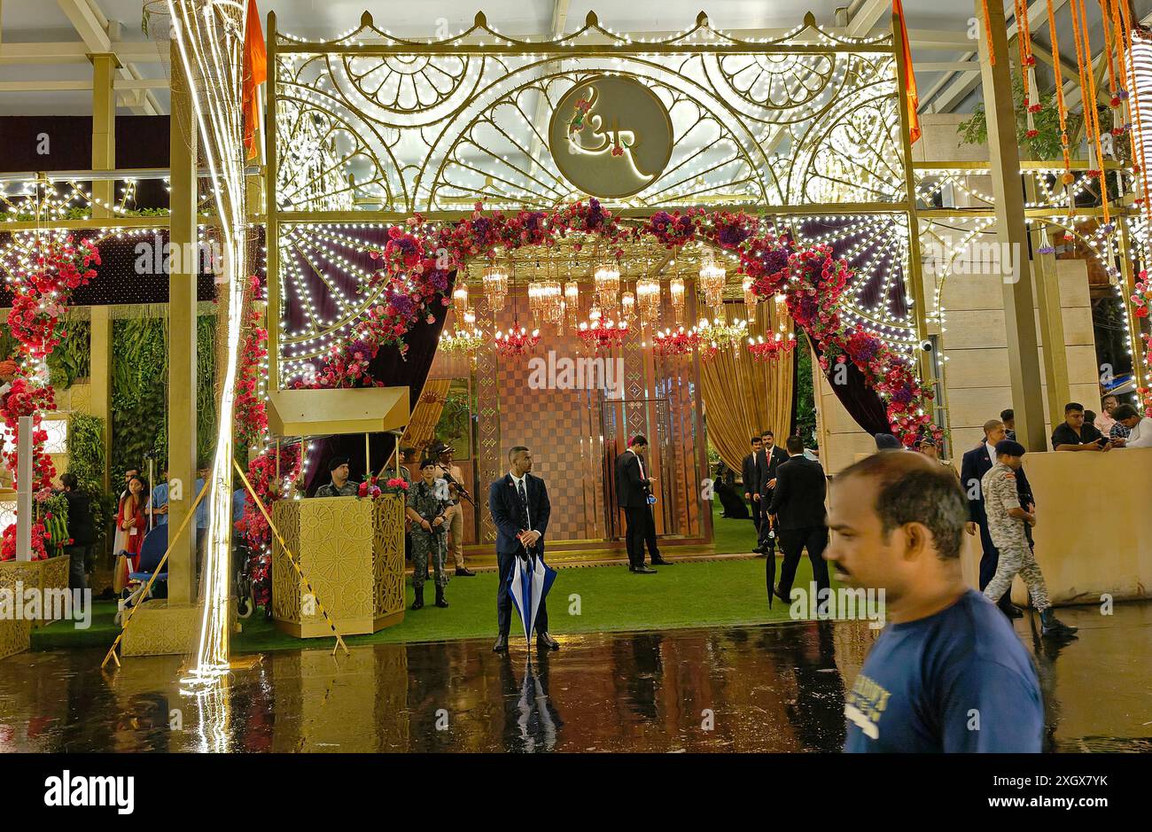 Security personnel are seen standing outside the Indian businessman ...